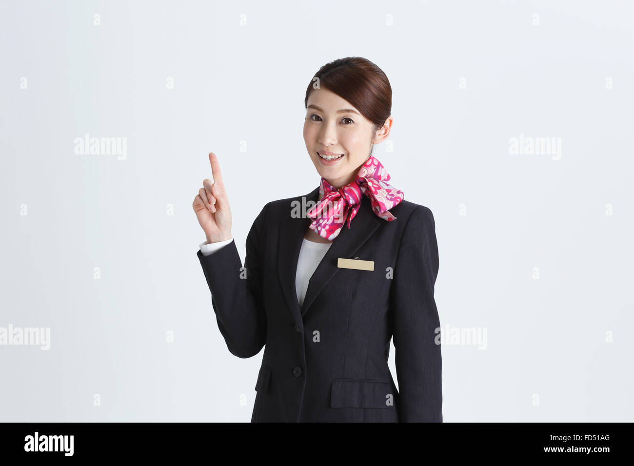 Attractive Japanese concierge Stock Photo - Alamy