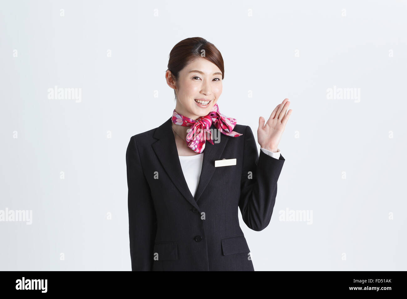 Attractive Japanese concierge Stock Photo - Alamy