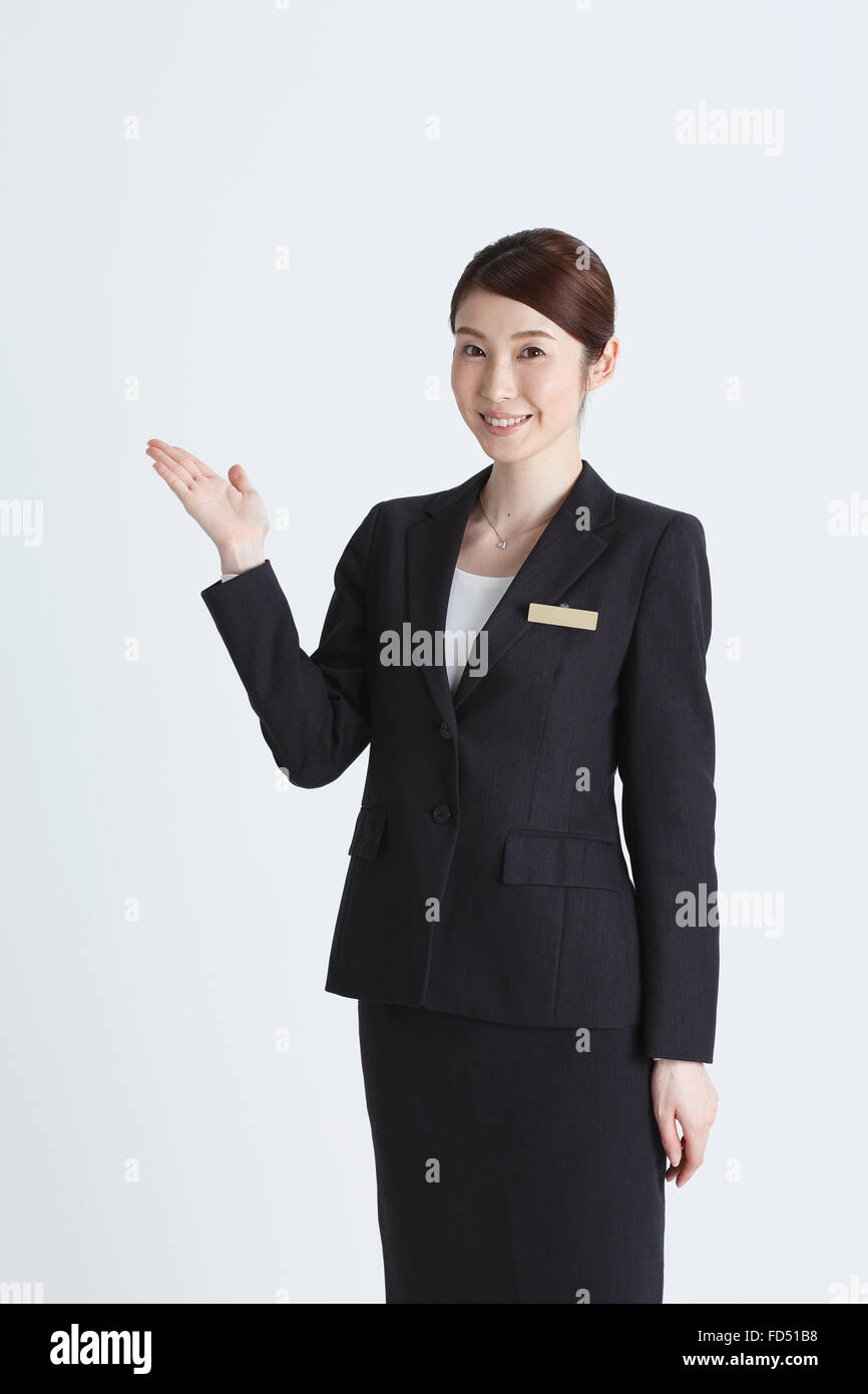 Attractive Japanese concierge Stock Photo - Alamy