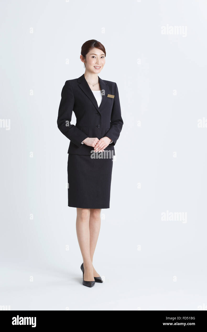 Attractive Japanese concierge Stock Photo - Alamy