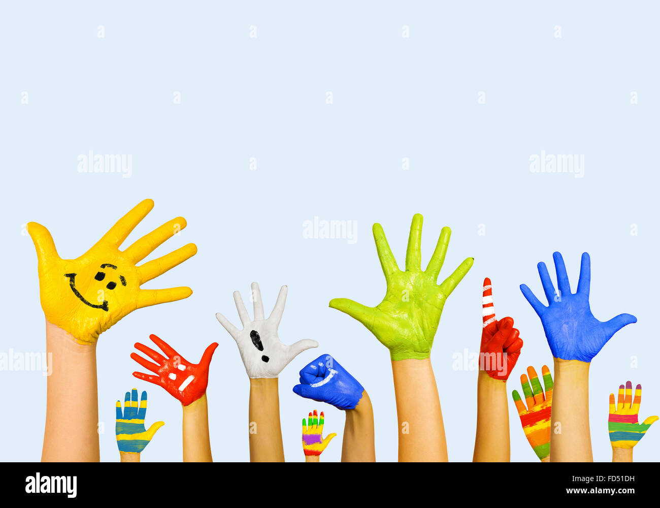 Image of human hands in colorful paint with smiles Stock Photo - Alamy