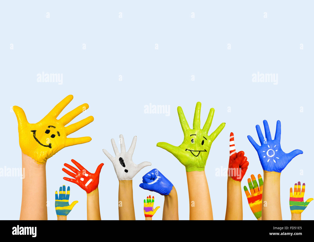 Image of human hands in colorful paint with smiles Stock Photo - Alamy