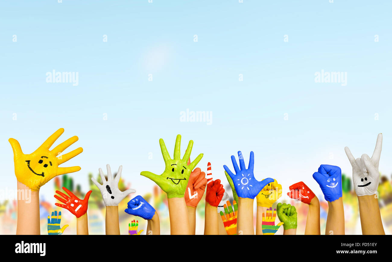 Image of human hands in colorful paint with smiles Stock Photo - Alamy