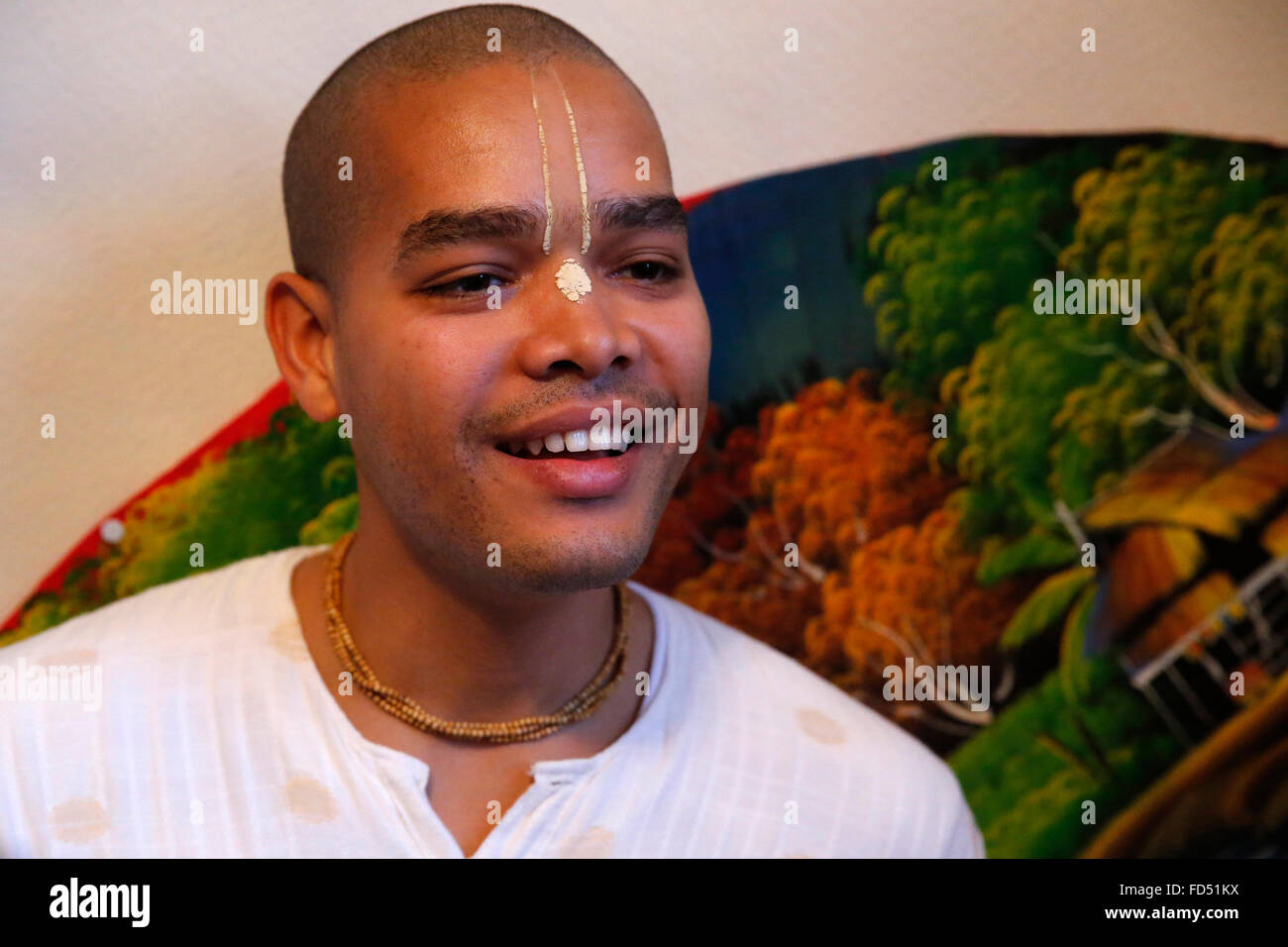 Krishna devotee in an ISKCON temple Stock Photo - Alamy