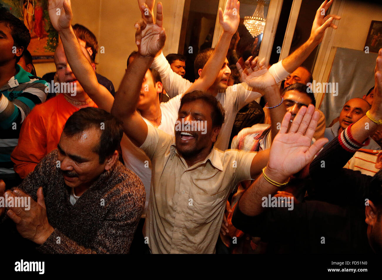 Devotees dancing in an ISKCON temple Stock Photo - Alamy