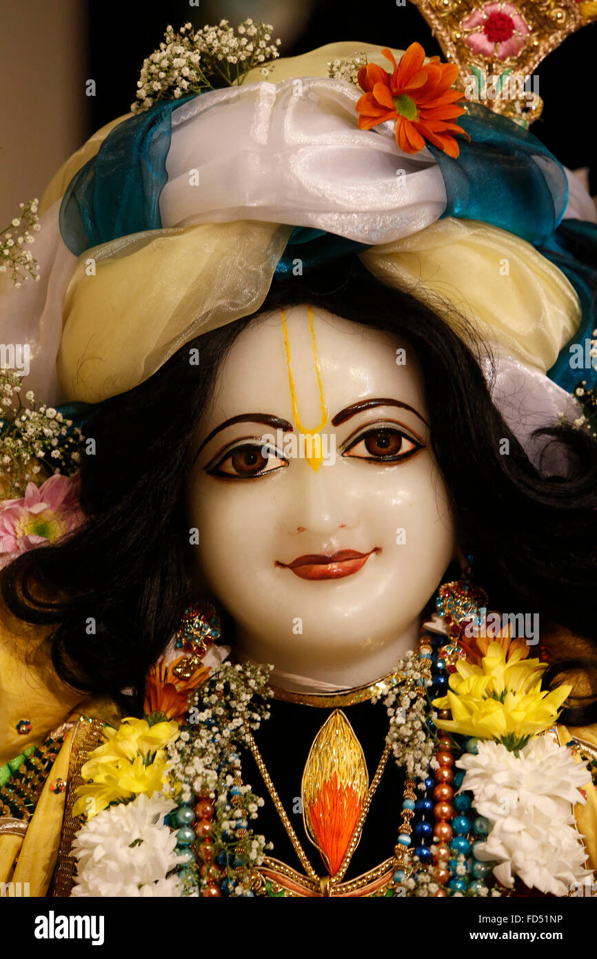 Celebration of Diwali festival in an ISKCON temple. Hindu statue ...