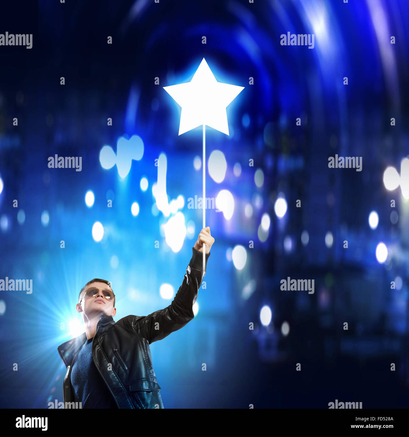 Image of young man rock musician in lights Stock Photo - Alamy