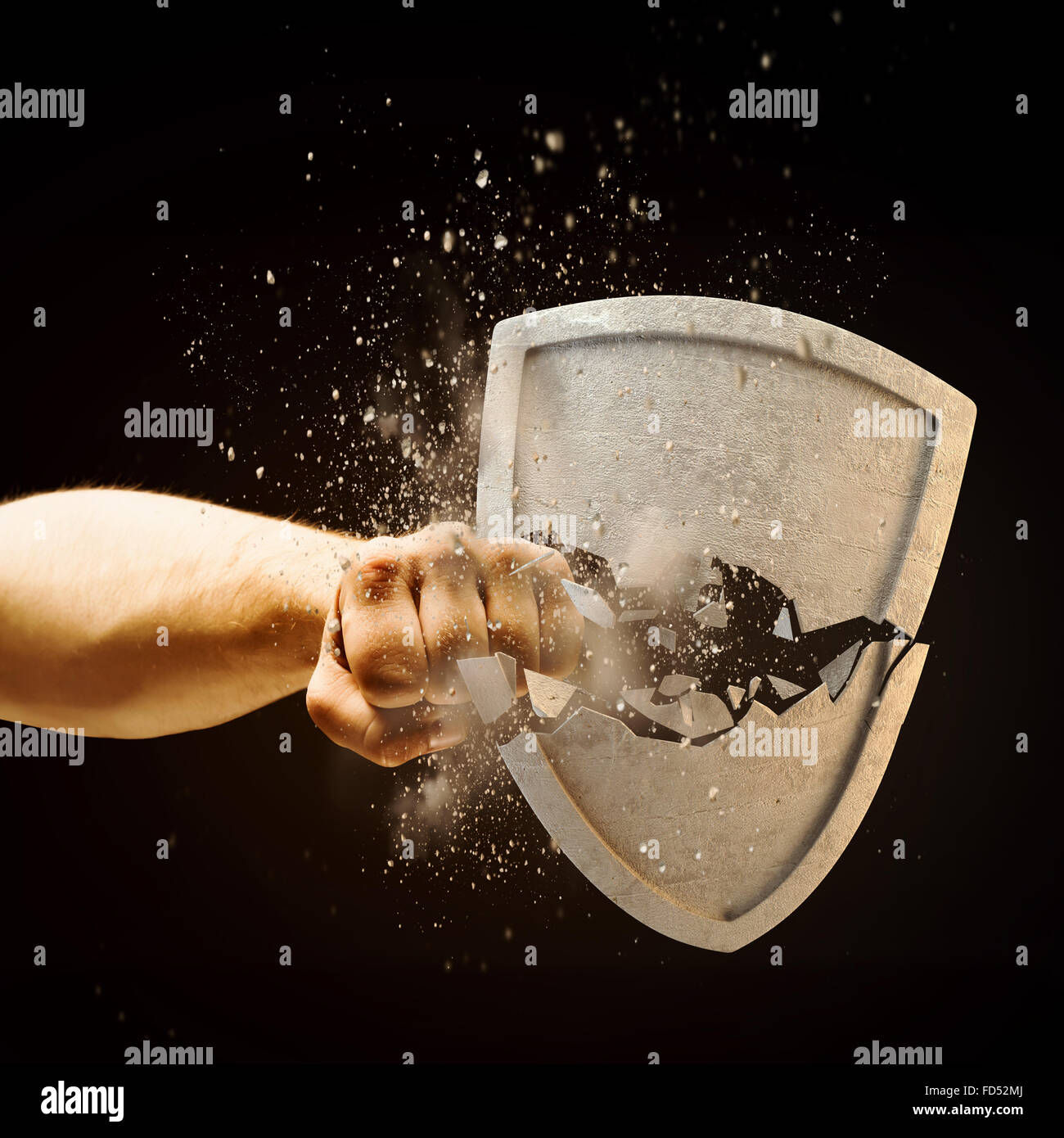 Close up of human hand breaking stone shield Stock Photo - Alamy