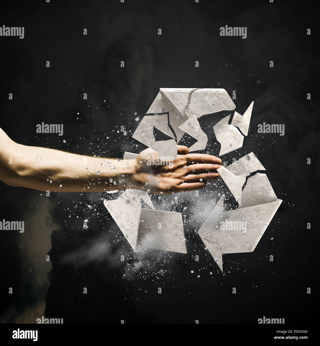 Close up image of human hand breaking recycle stone symbol Stock Photo ...