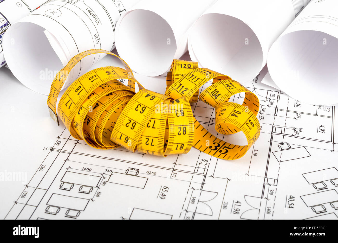 Tape measure on blueprint Stock Photo - Alamy