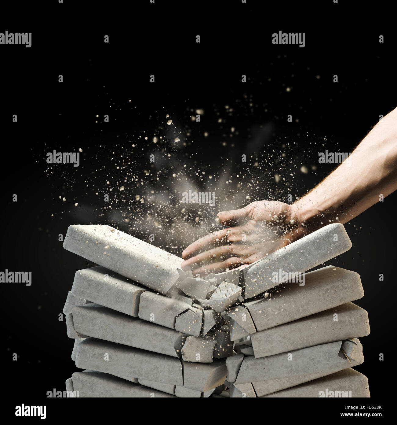 Close up of human hand breaking bricks Stock Photo - Alamy