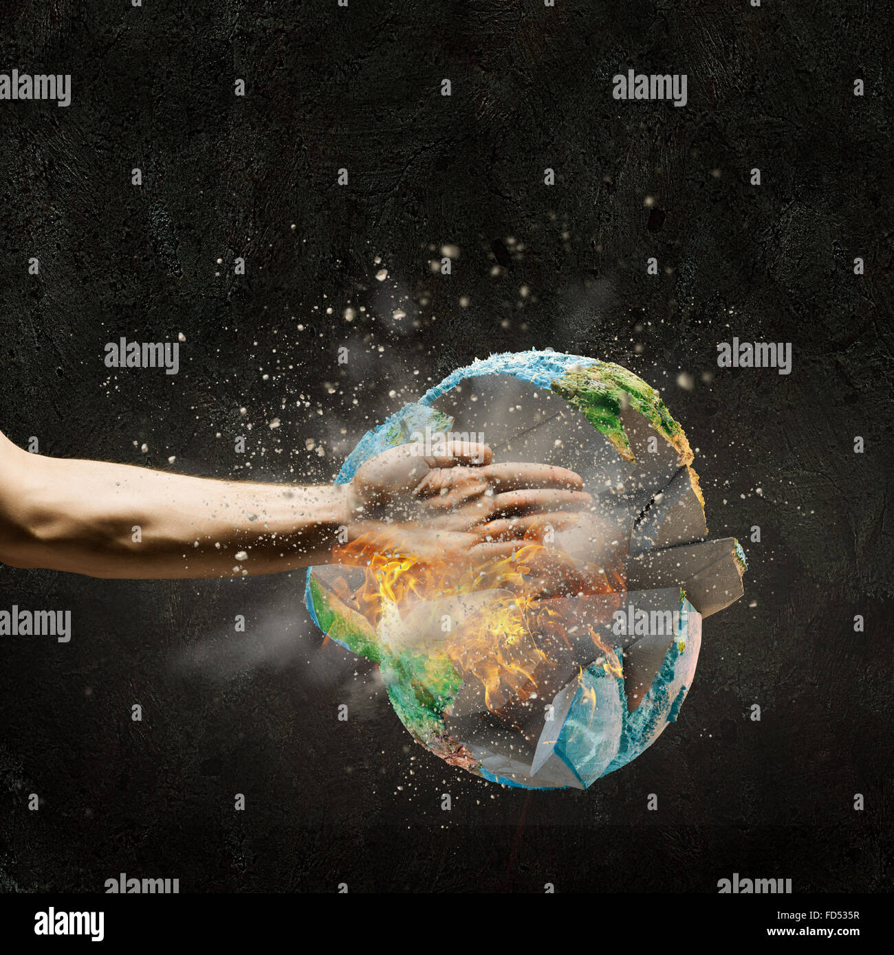 Close up image of human hand breaking earth planet Stock Photo - Alamy
