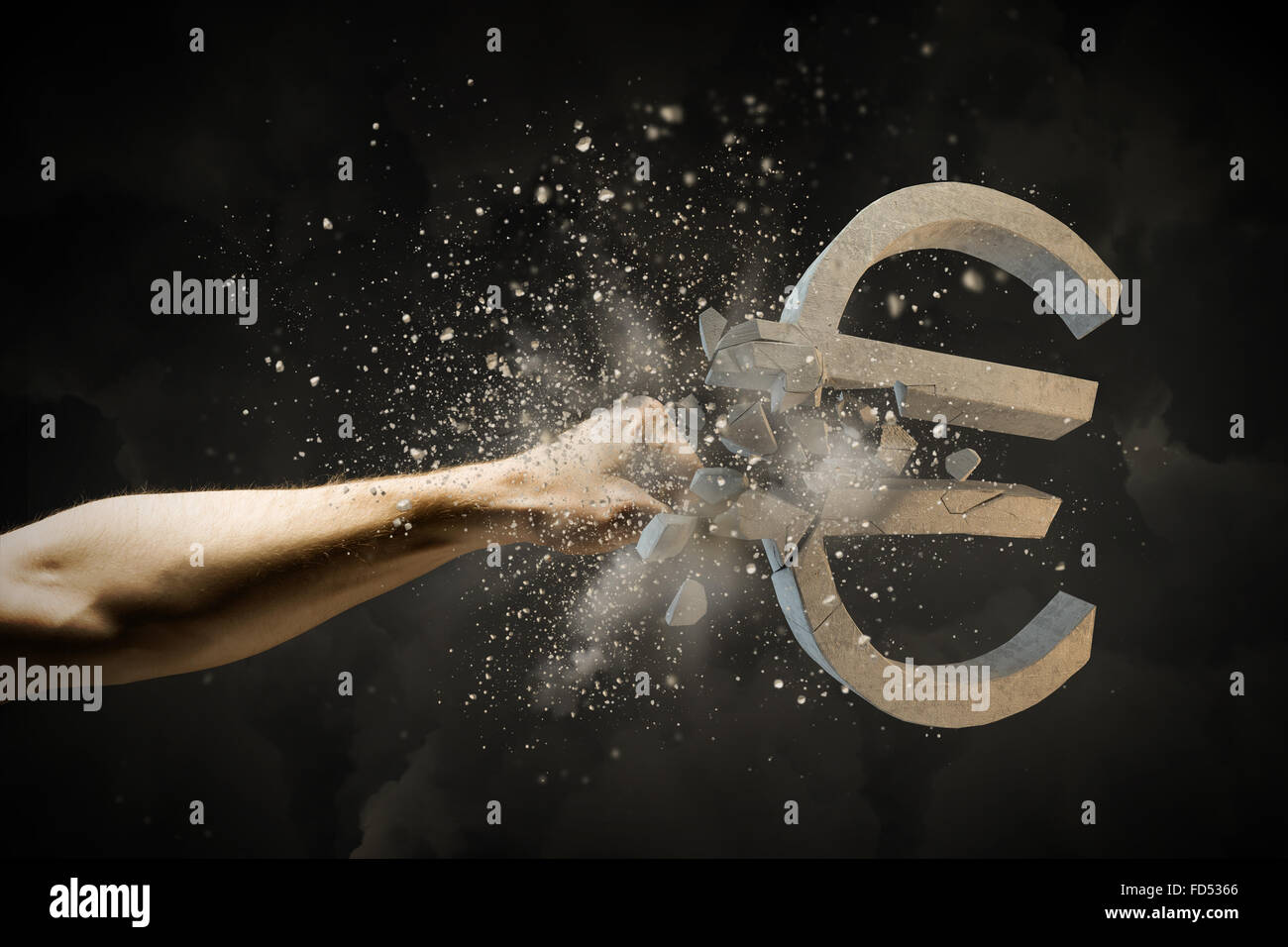 Close up image of human hand breaking euro stone symbol Stock Photo - Alamy