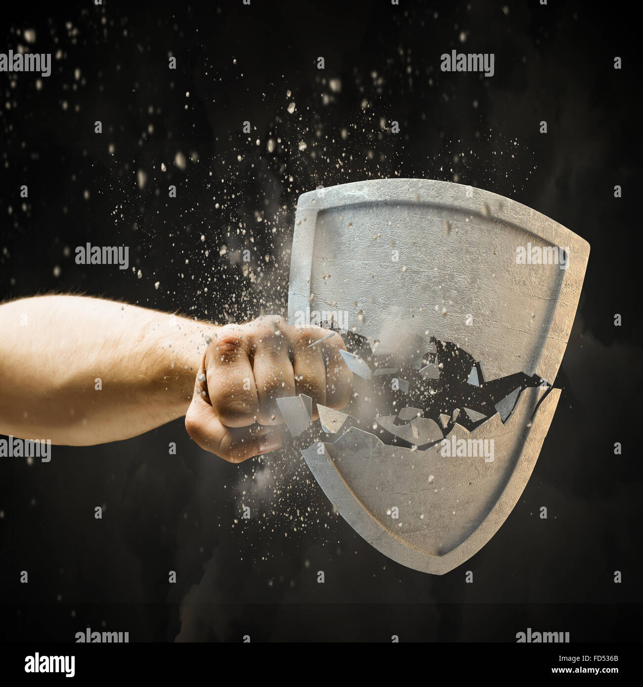 Close up of human hand breaking stone shield Stock Photo - Alamy