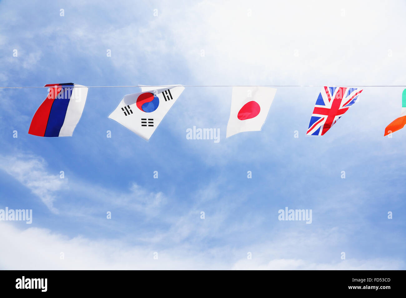 Flags in the wind Stock Photo - Alamy