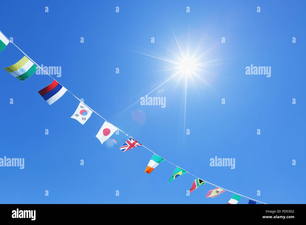 Colorful flags in wind hi-res stock photography and images - Alamy
