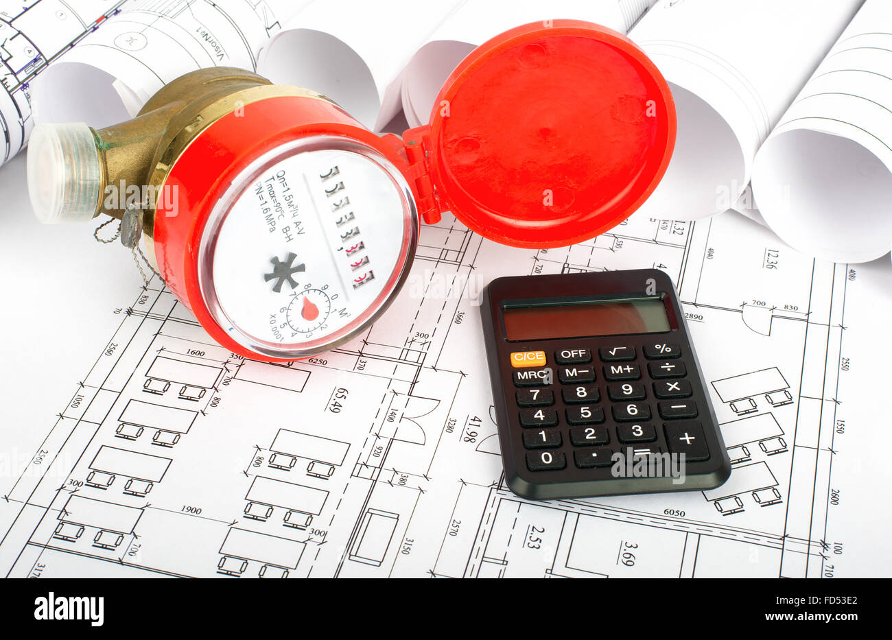 Water meter with calculator on blueprint Stock Photo - Alamy