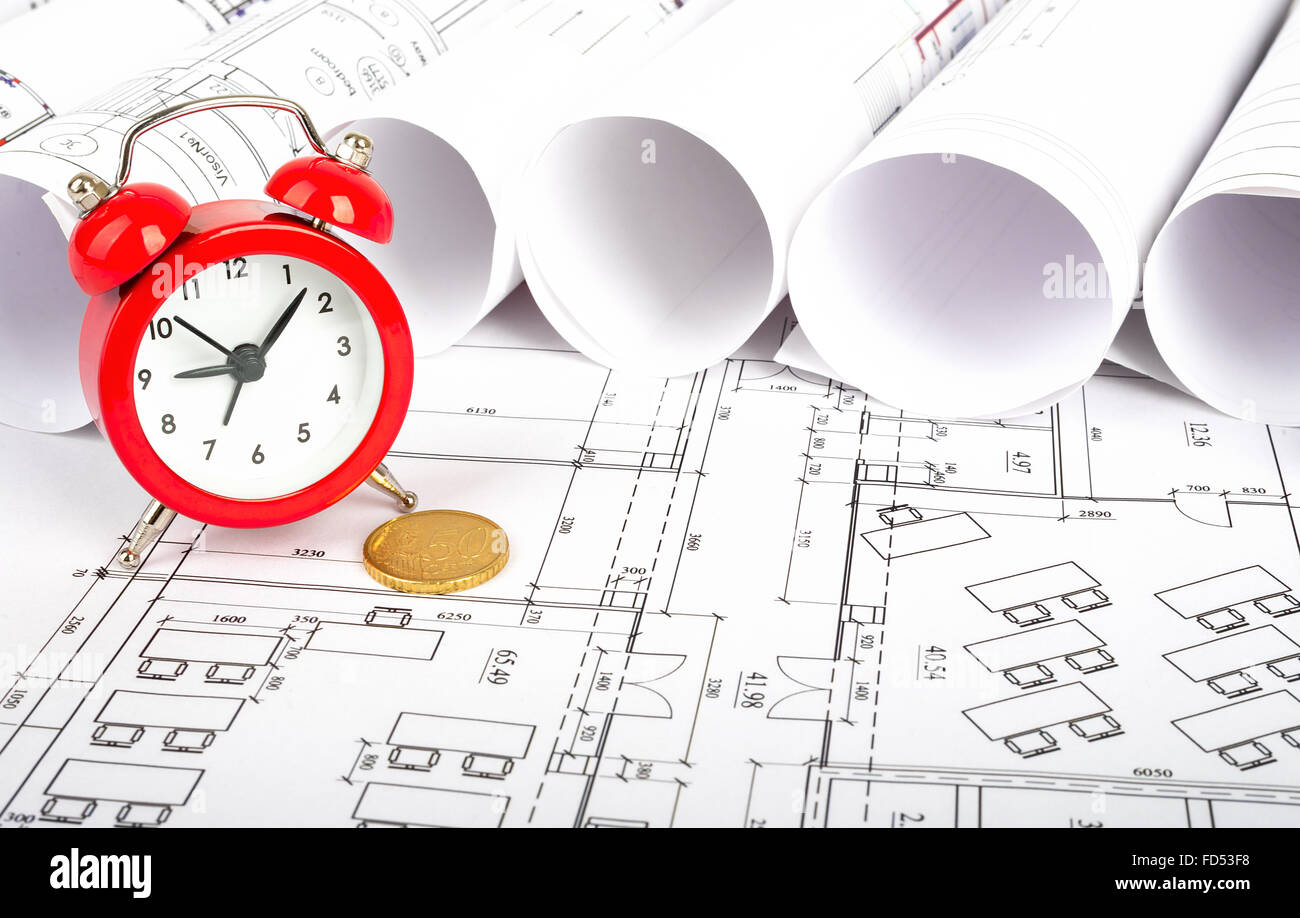 Alarm clock on blueprint Stock Photo - Alamy