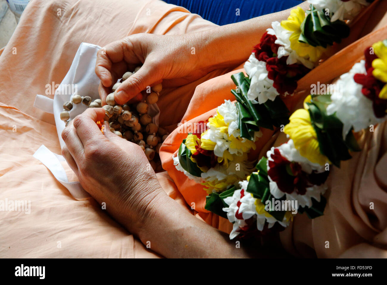 Devotee in an ISKCON temple Stock Photo - Alamy