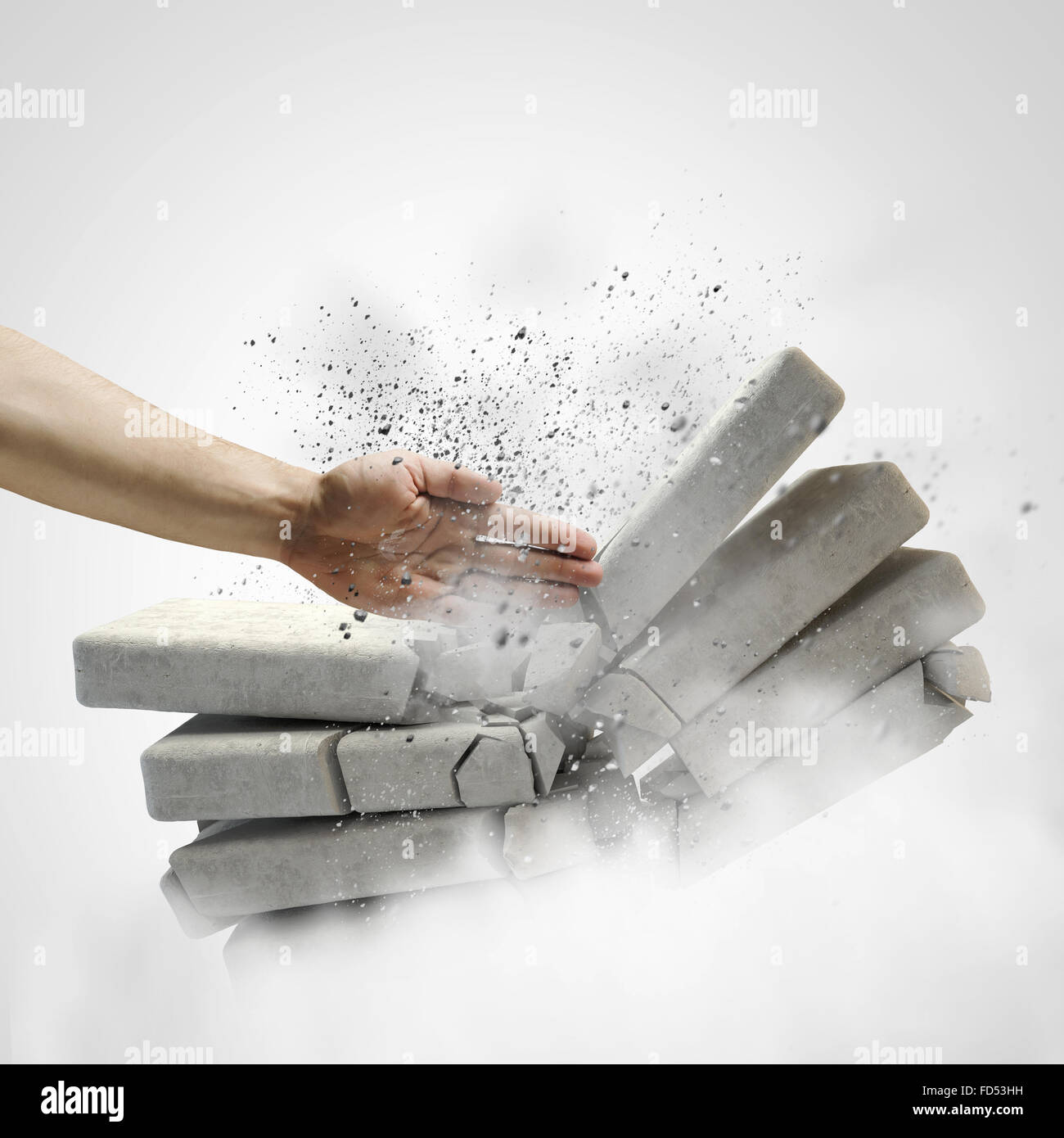 Hand breaking bricks hi-res stock photography and images - Alamy