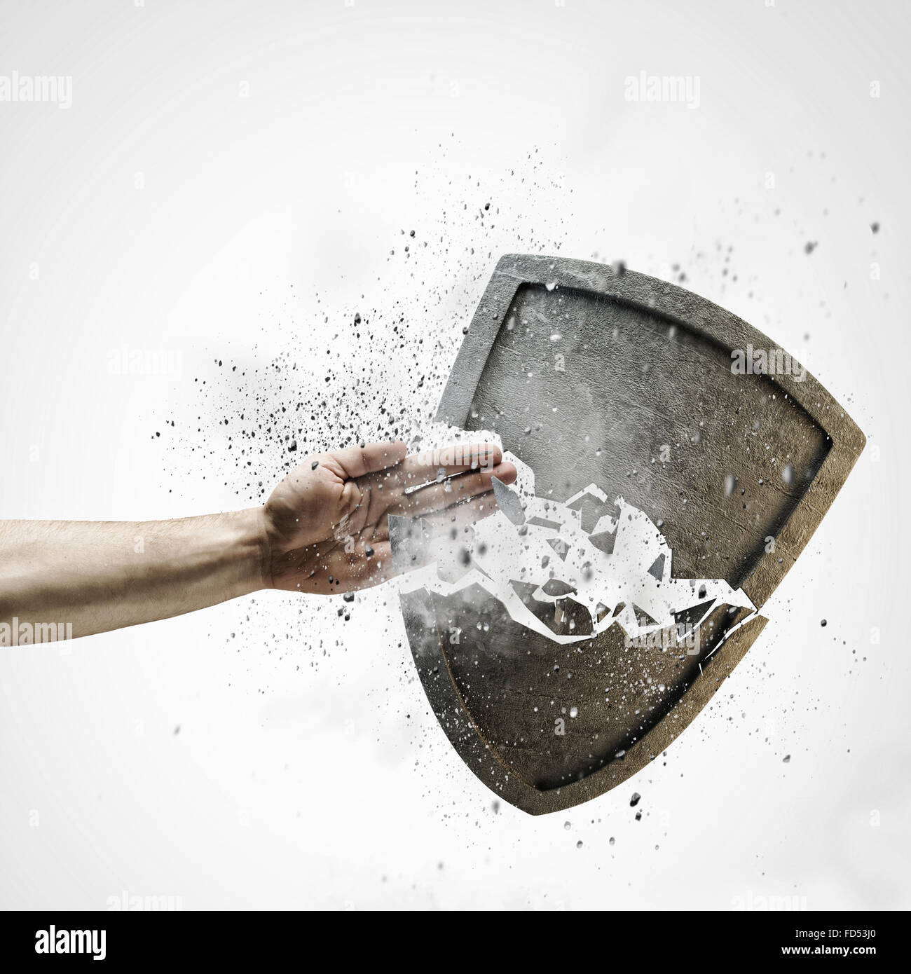 Close up of human hand breaking stone shield Stock Photo - Alamy