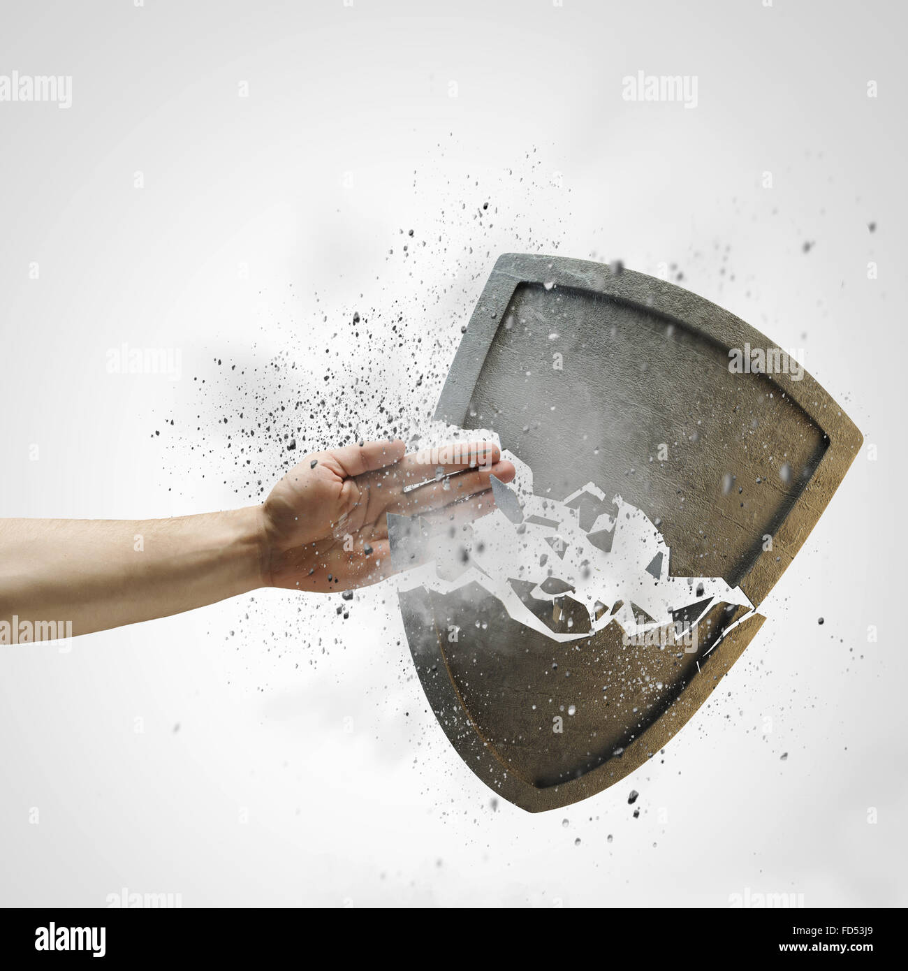 Close up of human hand breaking stone shield Stock Photo - Alamy