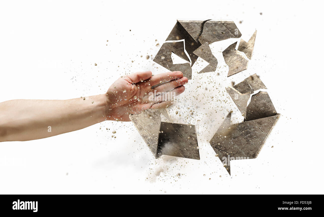 Close up image of human hand breaking recycle stone symbol Stock Photo ...