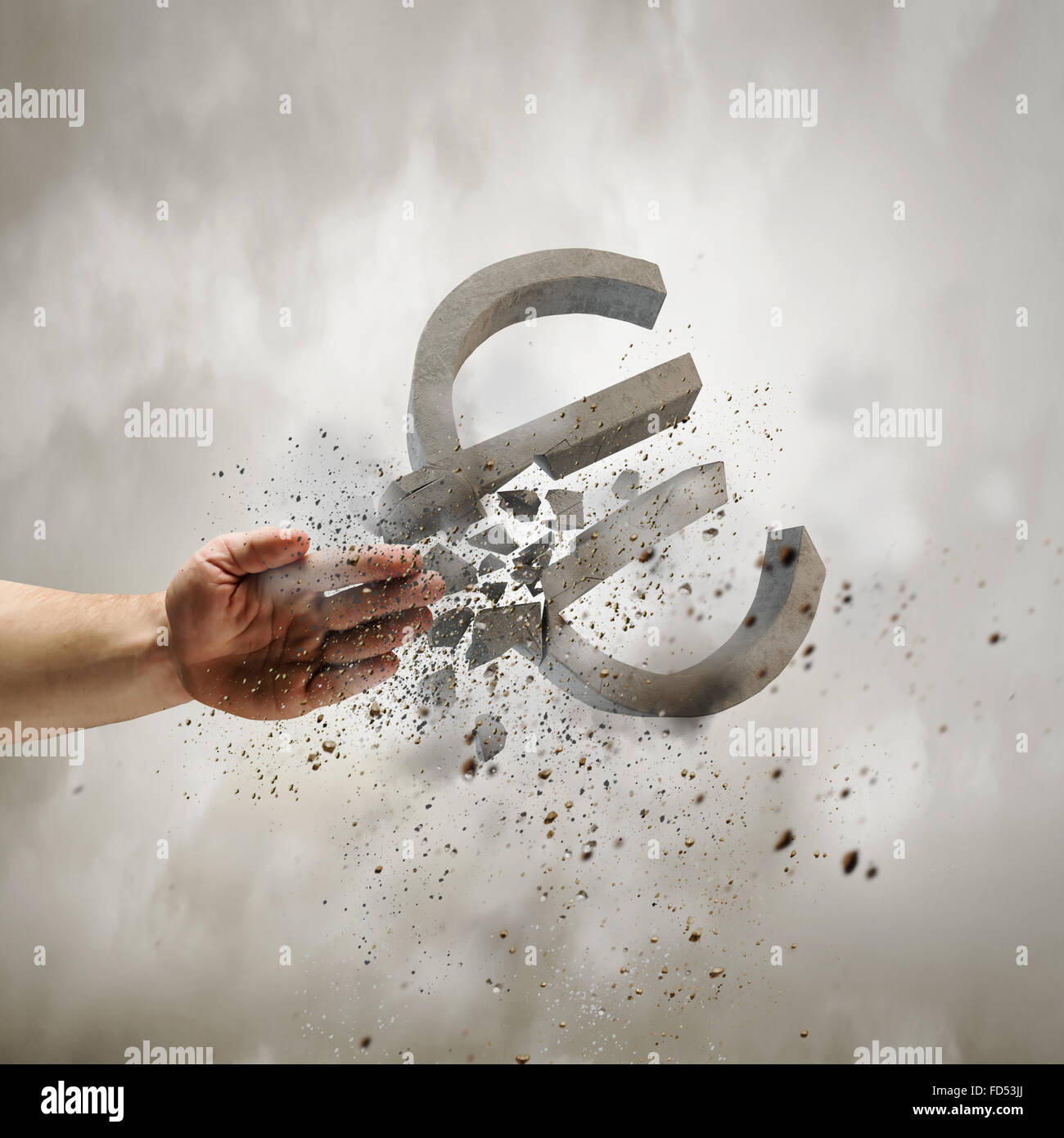 Close up image of human hand breaking euro stone symbol Stock Photo - Alamy