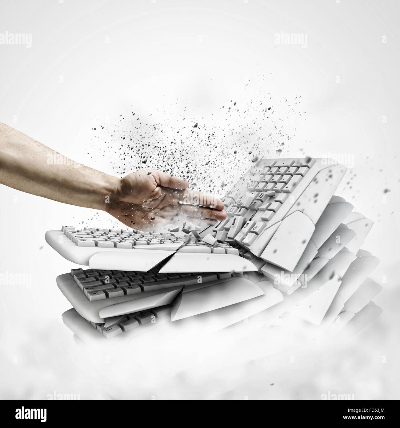 Image of human hand breaking pile of keyboards Stock Photo - Alamy