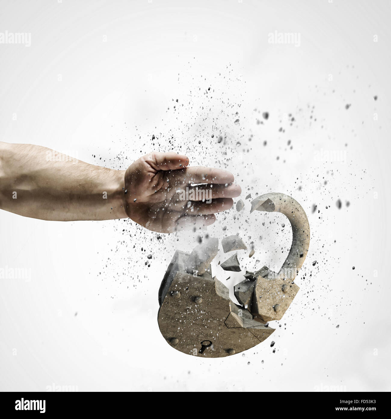 Image of human hand breaking stone lock Stock Photo - Alamy