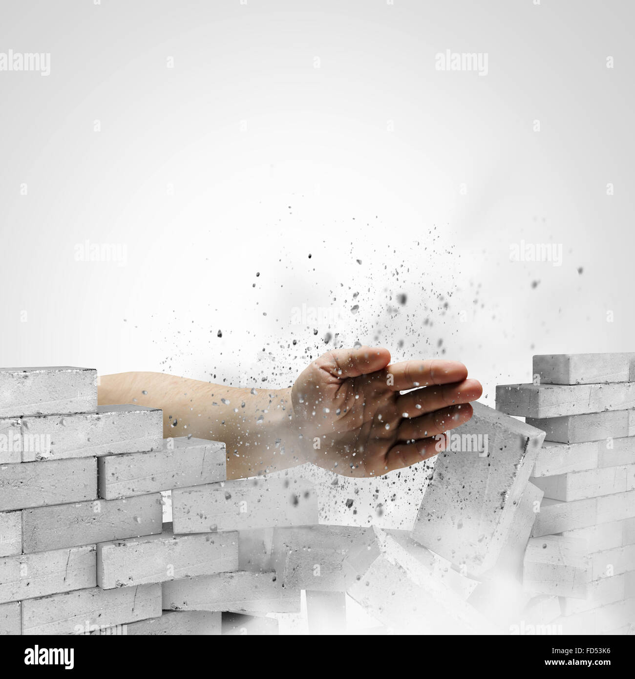 Close up of human hand breaking bricks Stock Photo - Alamy