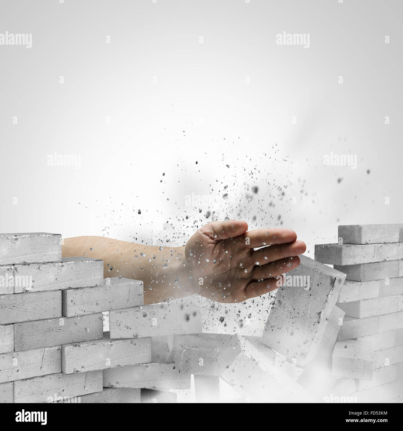 Hand breaking bricks hi-res stock photography and images - Alamy