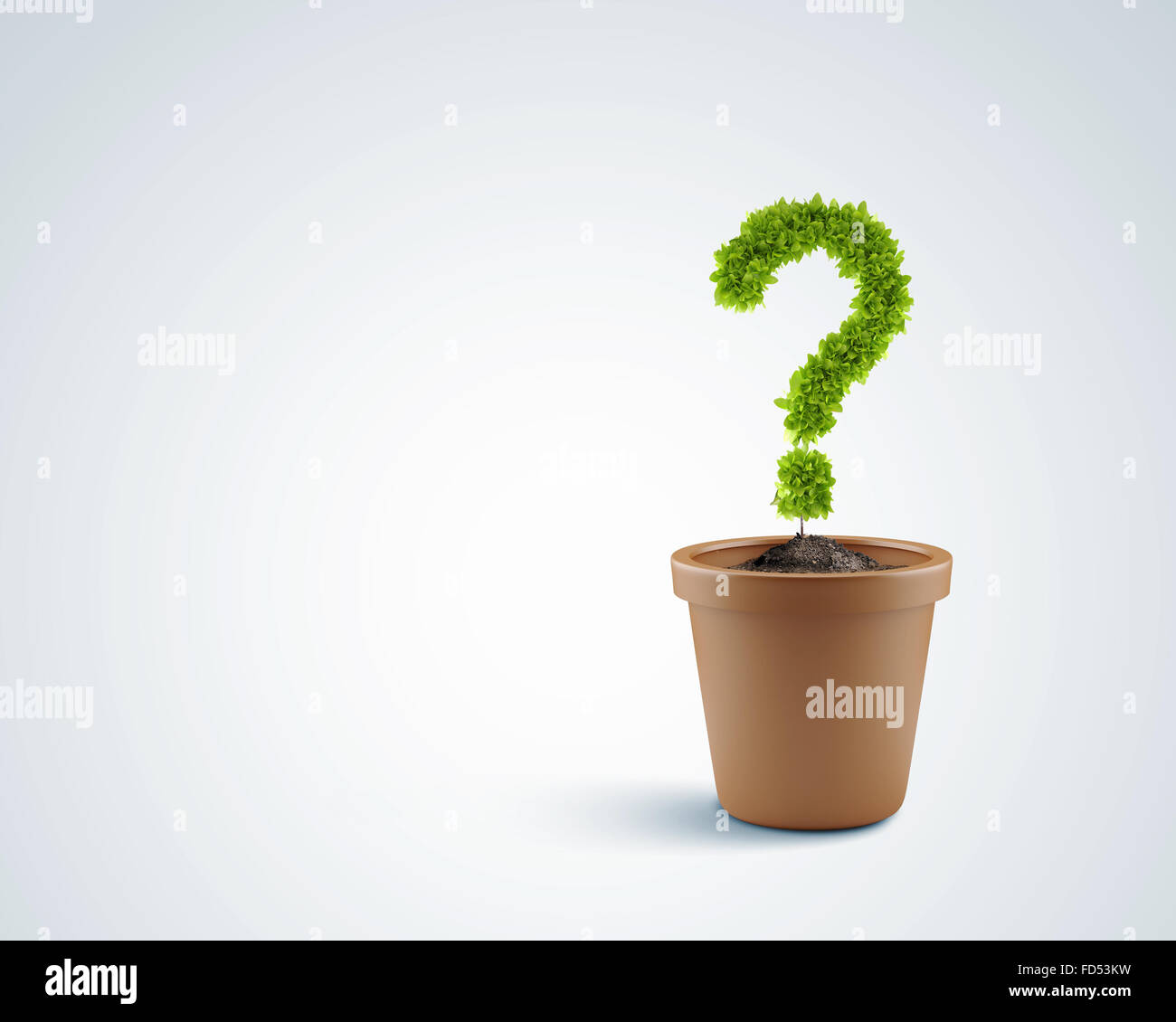 Image of plant pot with green question mark Stock Photo - Alamy