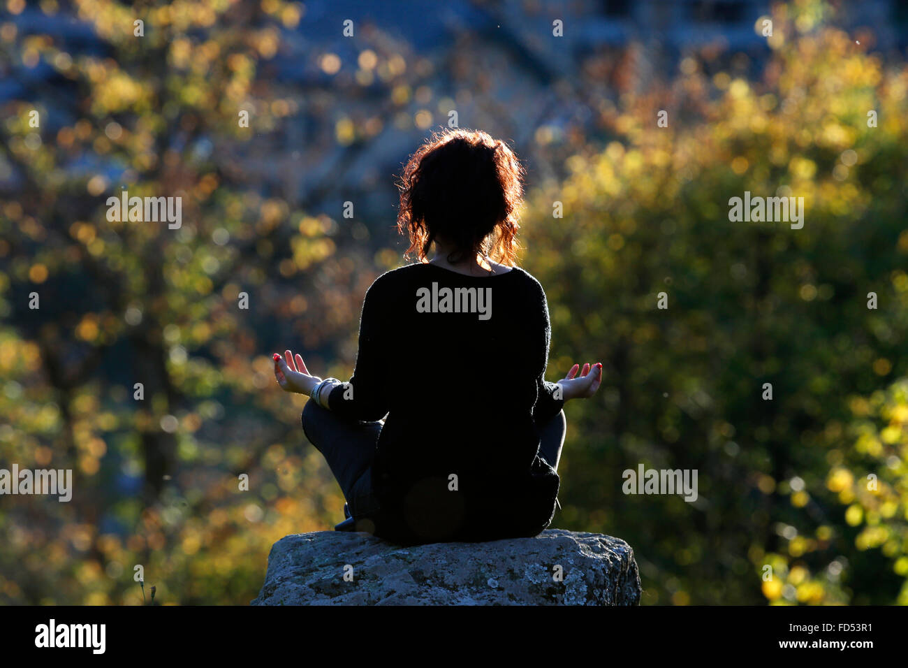Sitting on a rock hi-res stock photography and images - Alamy