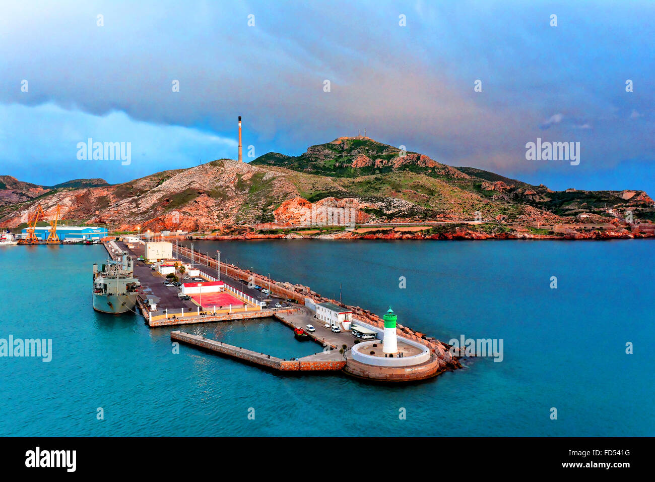 Spain Cartagena harbour starboard green lighthouse Stock Photo - Alamy