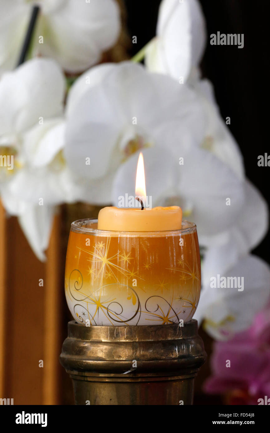 Buddhist candle in a temple Stock Photo - Alamy