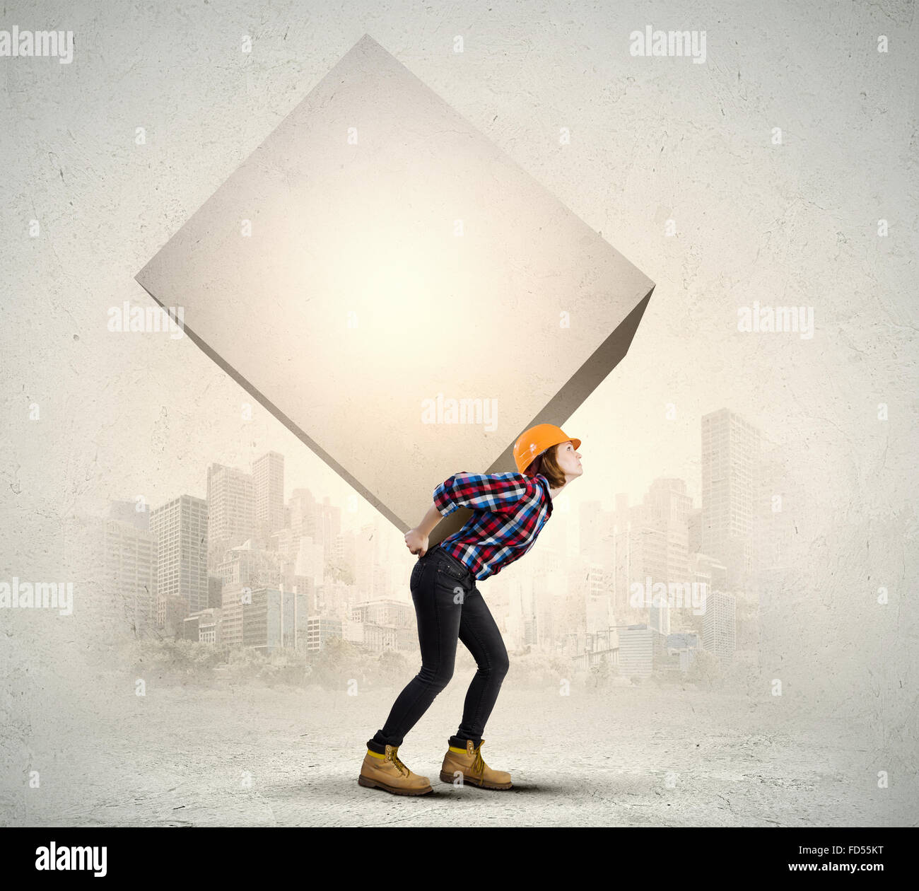 Image of woman engineer in helmet carrying burden on back Stock Photo ...