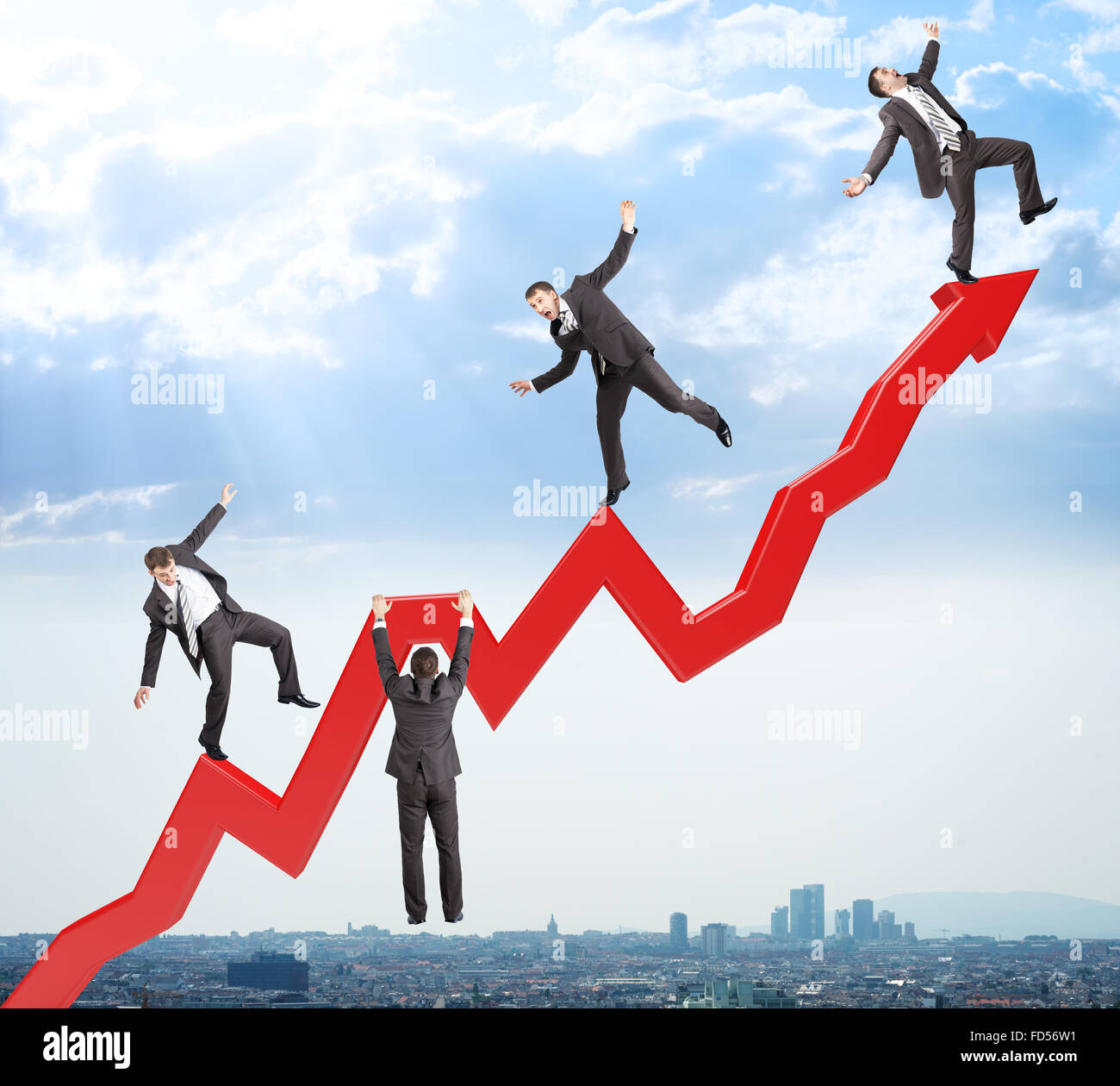 Set of businessmen trying not to fall from arrow Stock Photo - Alamy
