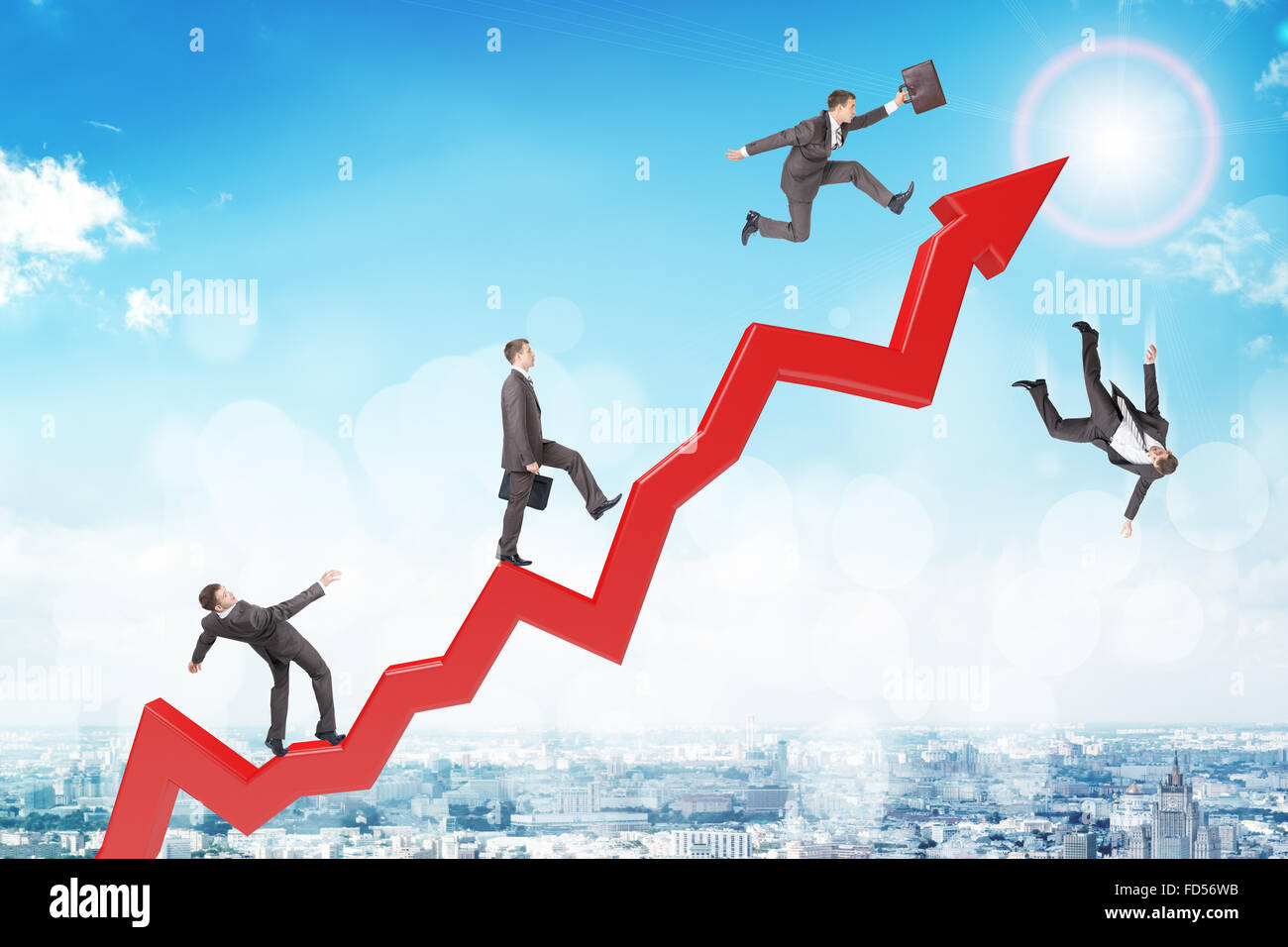 Set of businessmen trying not to fall from arrow Stock Photo - Alamy