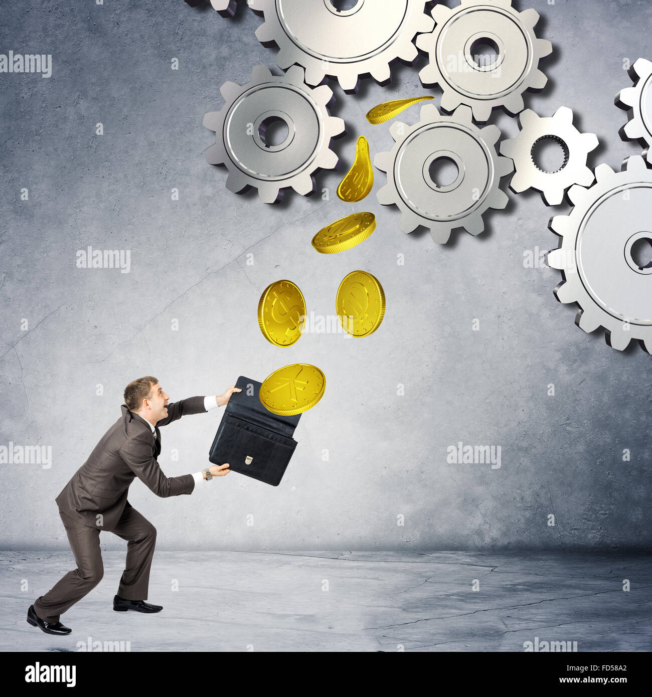 Happy businessman catching coins in suitcase Stock Photo - Alamy