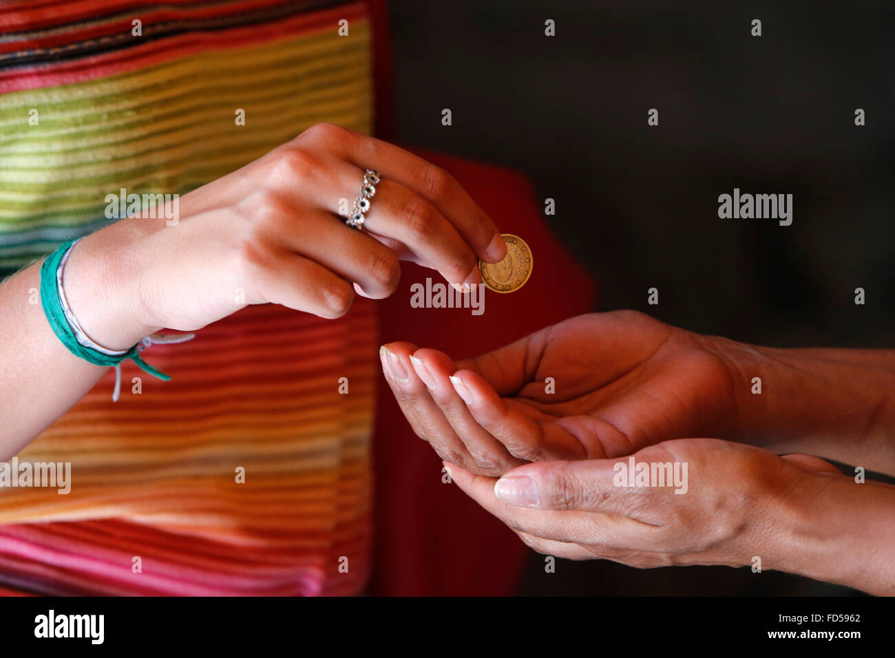 Giving alm hi-res stock photography and images - Alamy