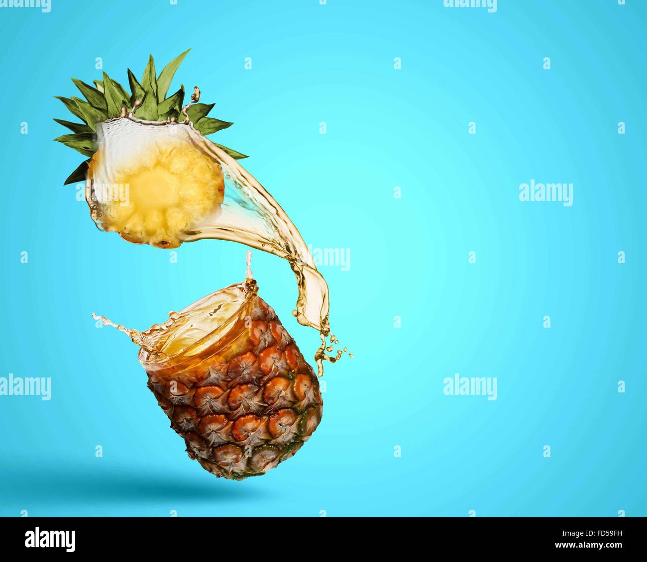 Image of fresh pineapple in juicy splashes Stock Photo - Alamy