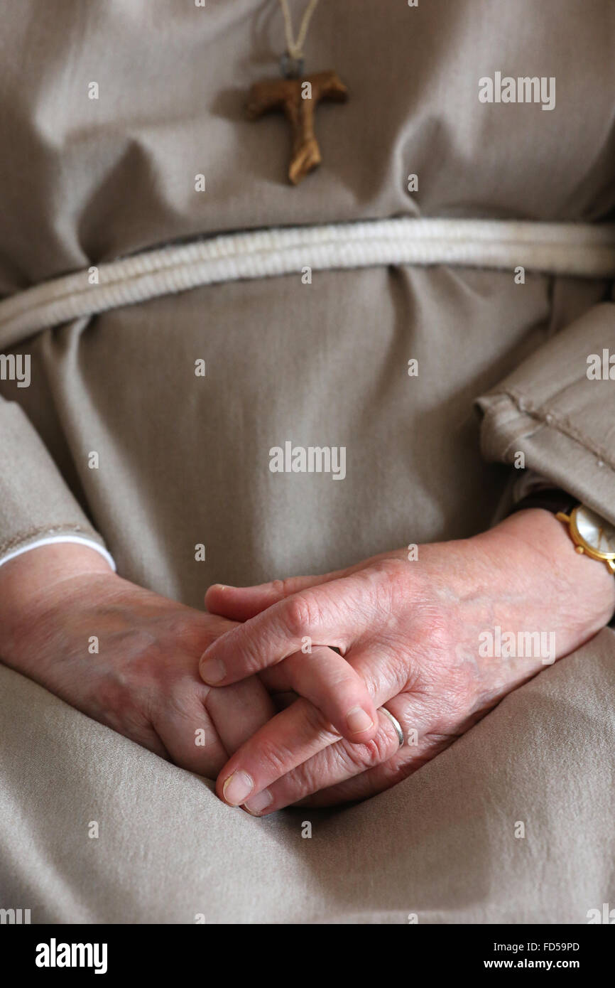 Visitation monastery. Catholic nun's hands Stock Photo - Alamy