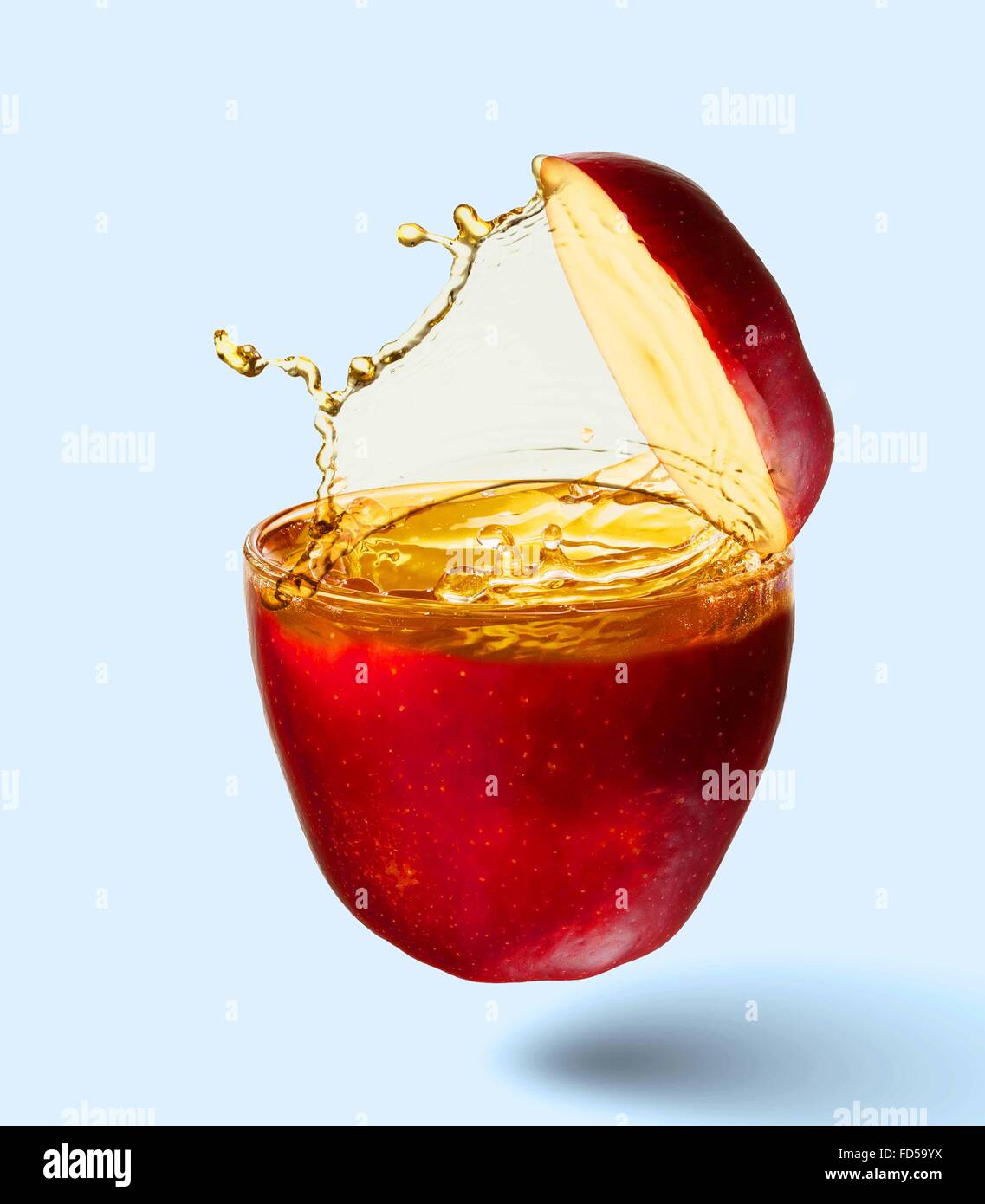 Image of juicy apple in splashes. Refreshing and healthy Stock Photo ...
