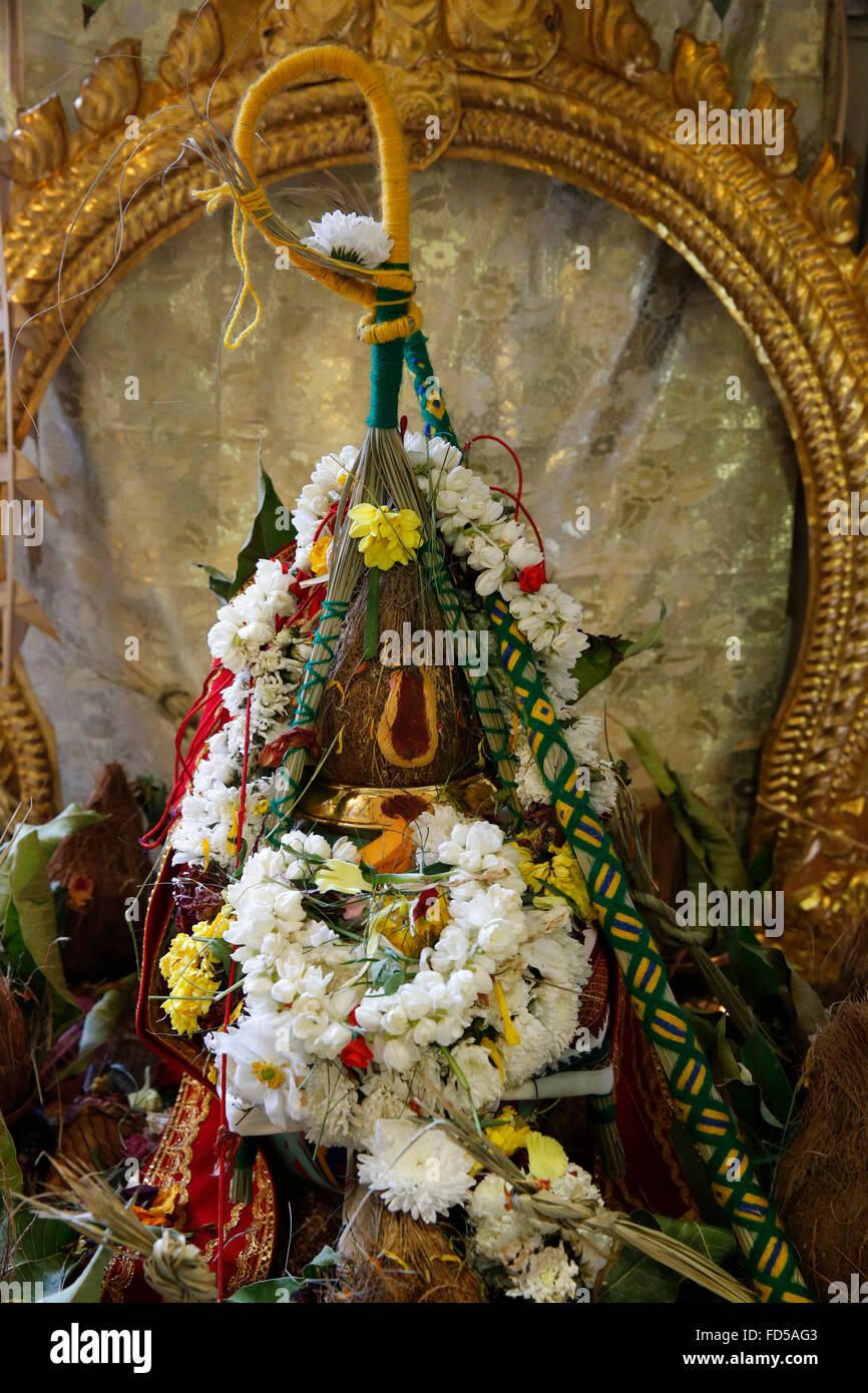 Ganesh temple in Paris. Coconut offering Stock Photo - Alamy