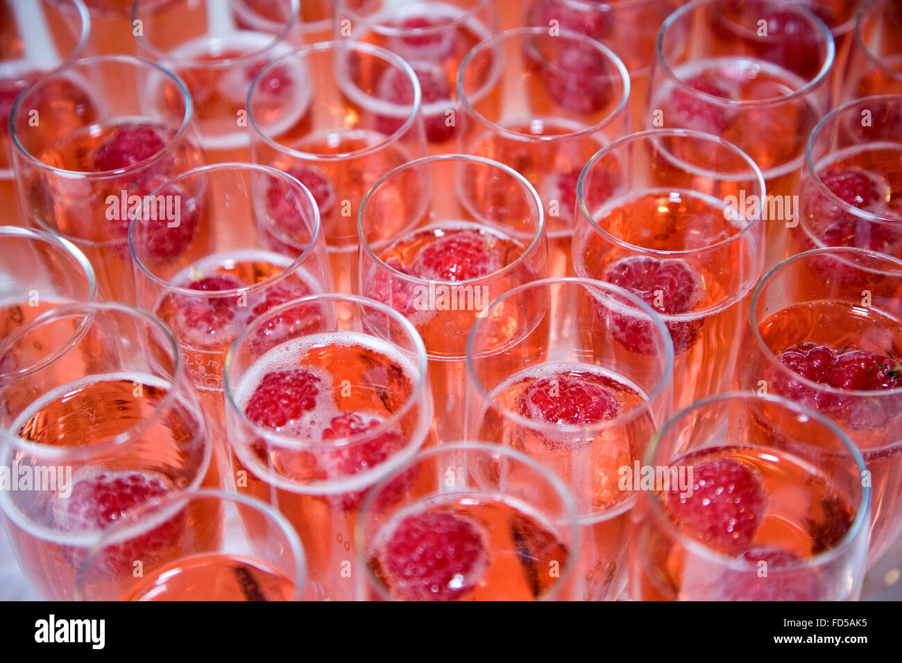 Summer sparkling wine drinks with raspberry Stock Photo - Alamy