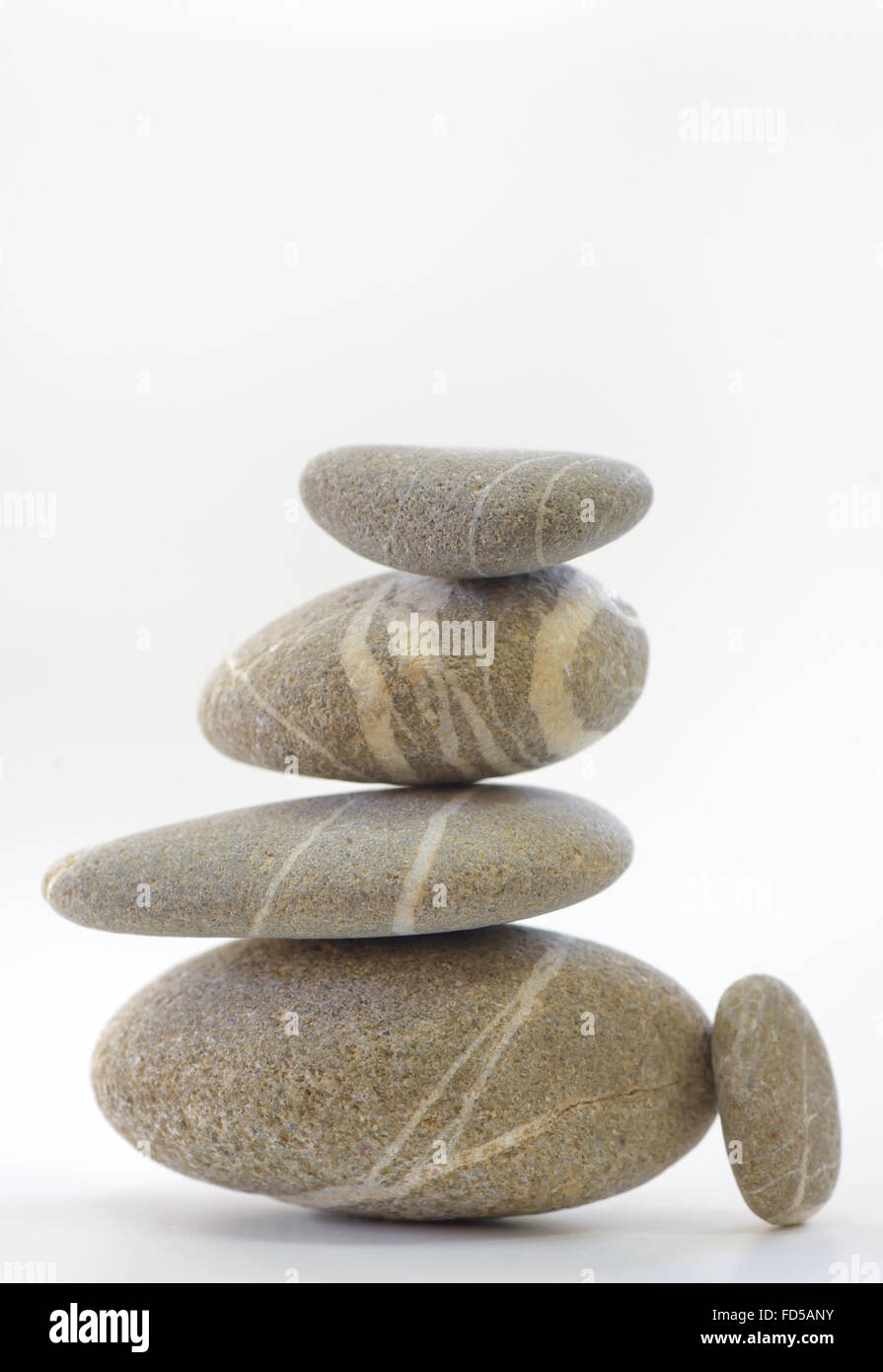 Pyramid of Stones isolated on white background Stock Photo - Alamy