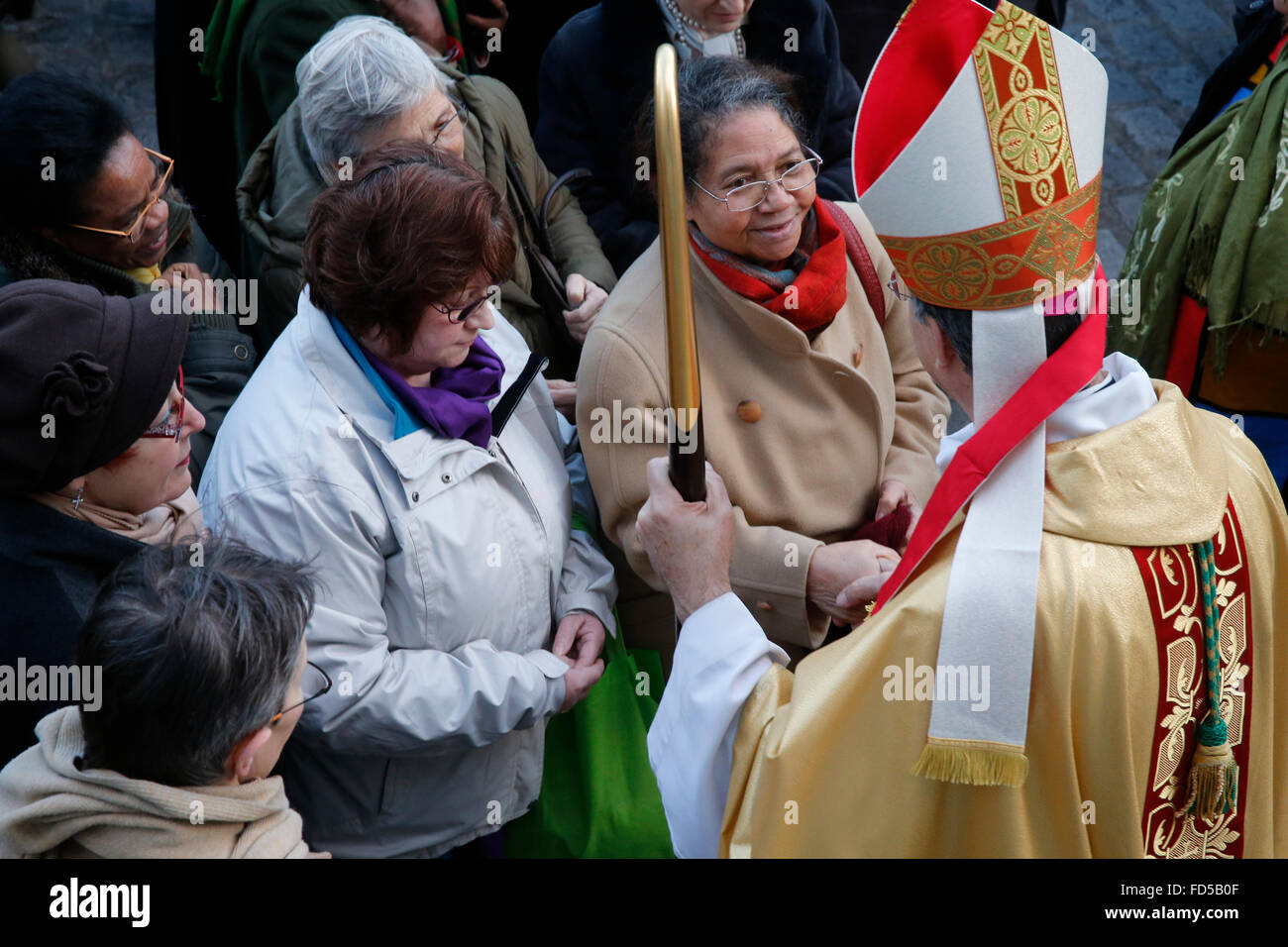 Catholic bishop blessing faithful after mass Stock Photo - Alamy
