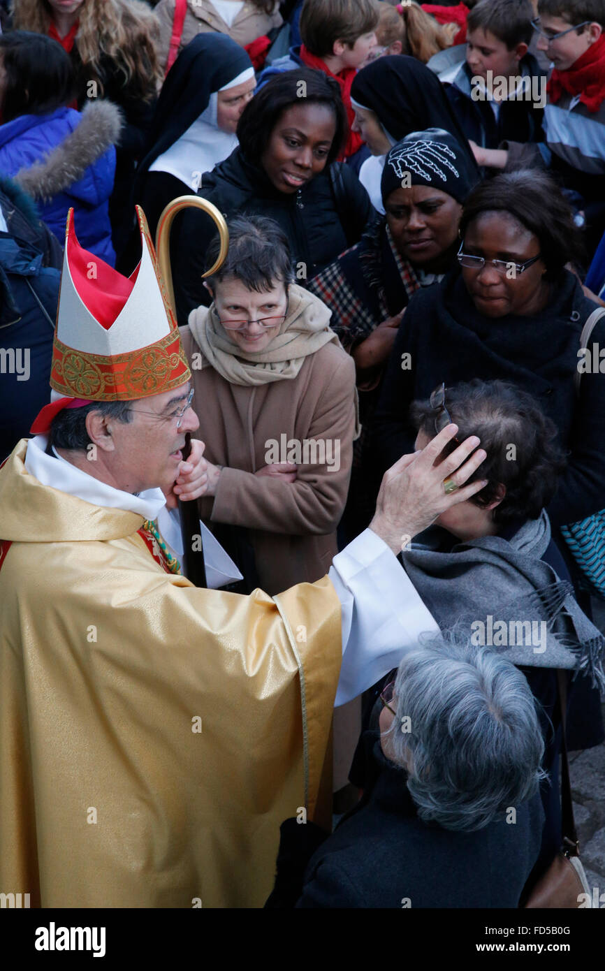 Catholic bishop blessing faithful after mass Stock Photo - Alamy