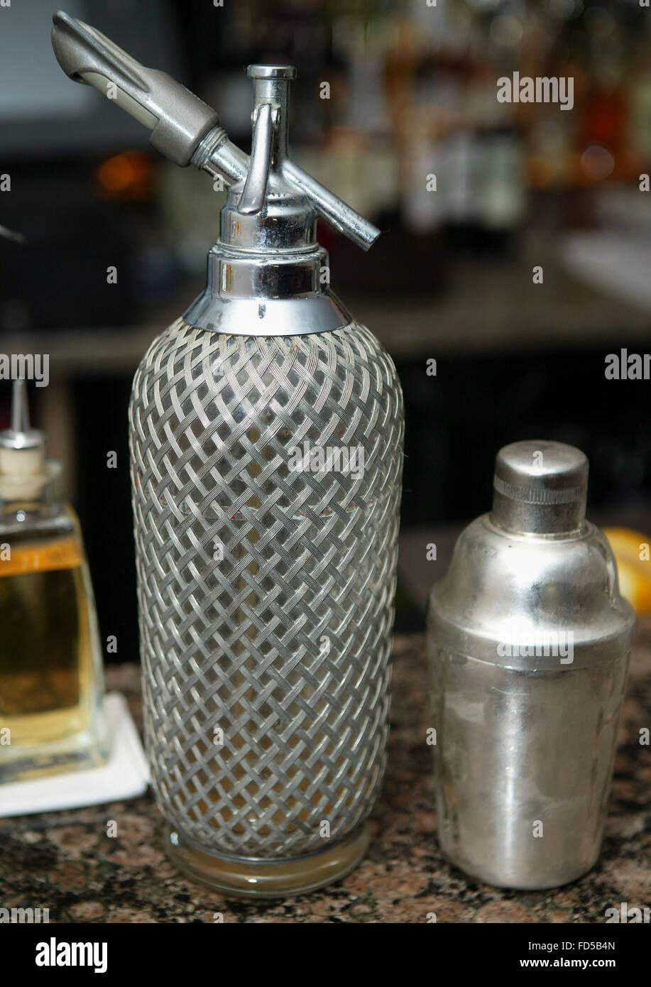 Old fashioned cocktail shaker and soda siphon on a bar Stock Photo - Alamy